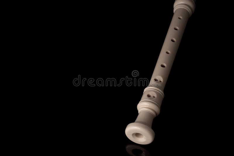 Classical Musical Instrument is the Block Flute on Black Background ...