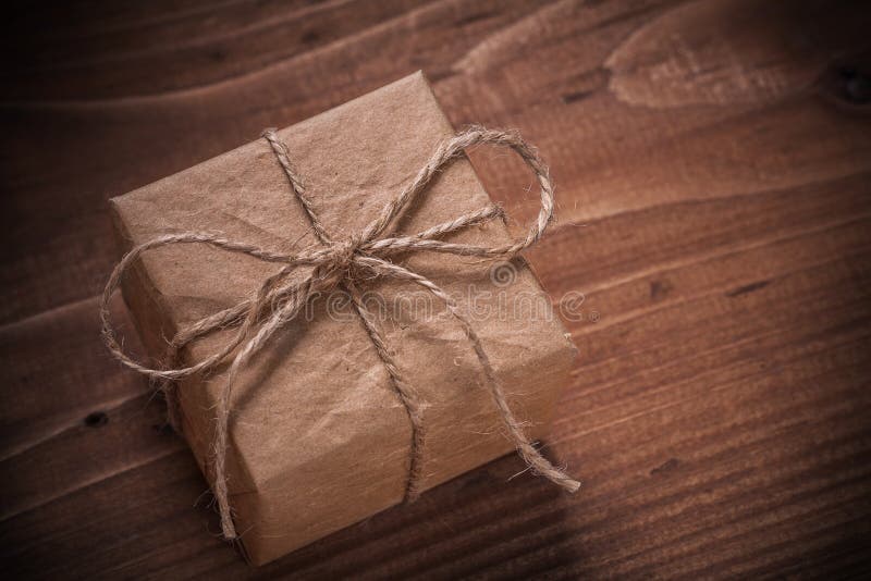 Classical Vintage Gift Box with String Bow on Wooden Board Stock Photo ...