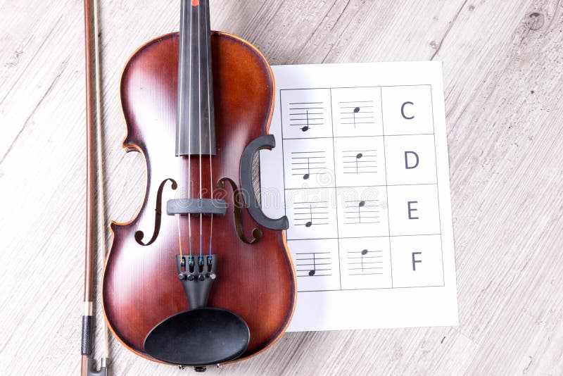 Classical Violin with Music Sheet Book Stock Photo - Image of front ...