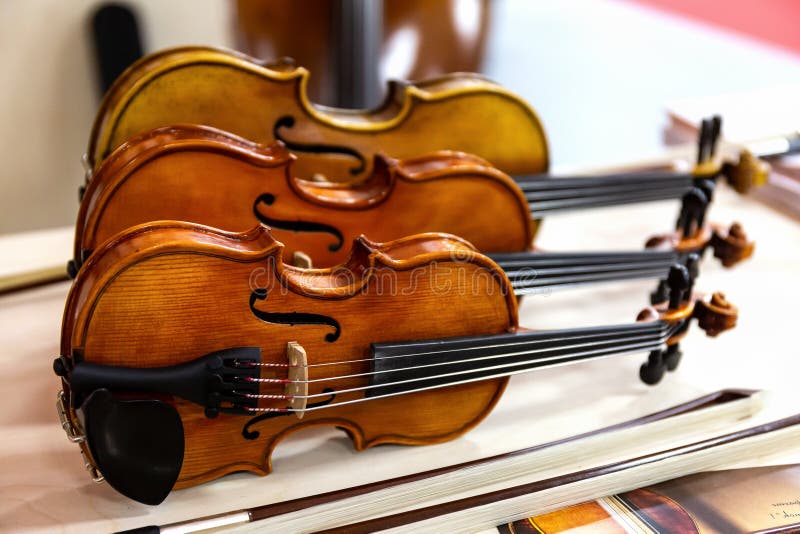 Classical Violins Standing on a Table Stock Photo - Image of education ...