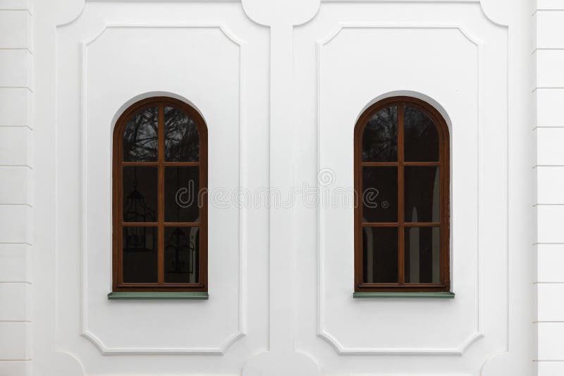 Classical Windows with Arches and Decorative Elements in White Wall ...