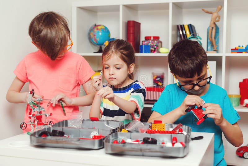 Classmates Doing Creative Mechanical Robot. Kids Doing School Project ...