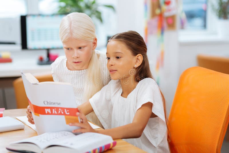 Classmates Doing Their Homework Together at Home Stock Image - Image of ...