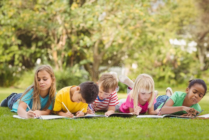 Classmates Concentrated On Futuristic Interface With DNA Stock Photo ...
