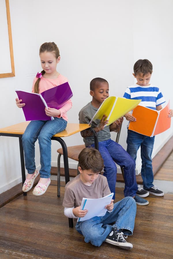 Classmates Reading Notepads Classroom Stock Photos - Free & Royalty ...