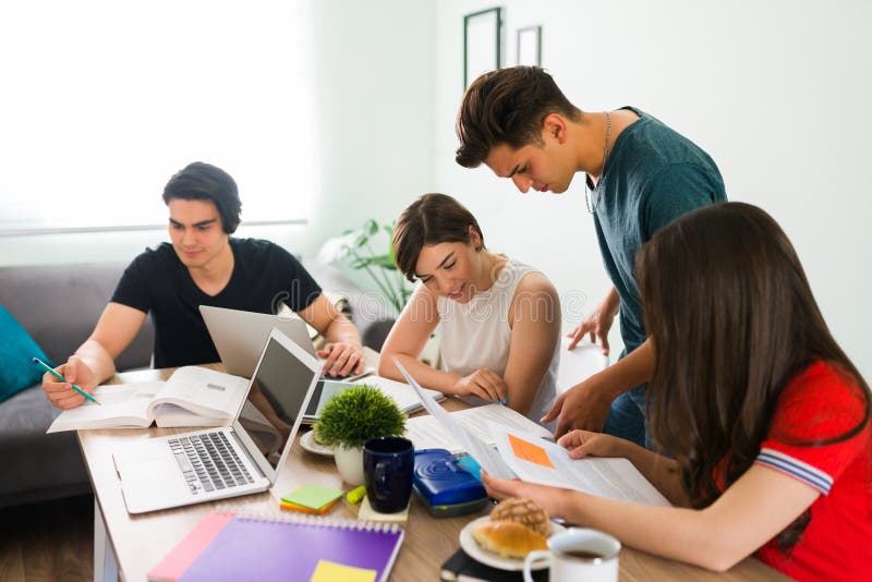 Classmates Reading Together an Essay Stock Image - Image of study ...