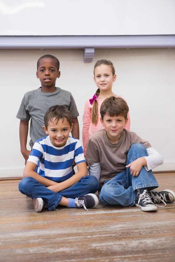 Classmates Smiling Together in Classroom Stock Photo - Image of ...