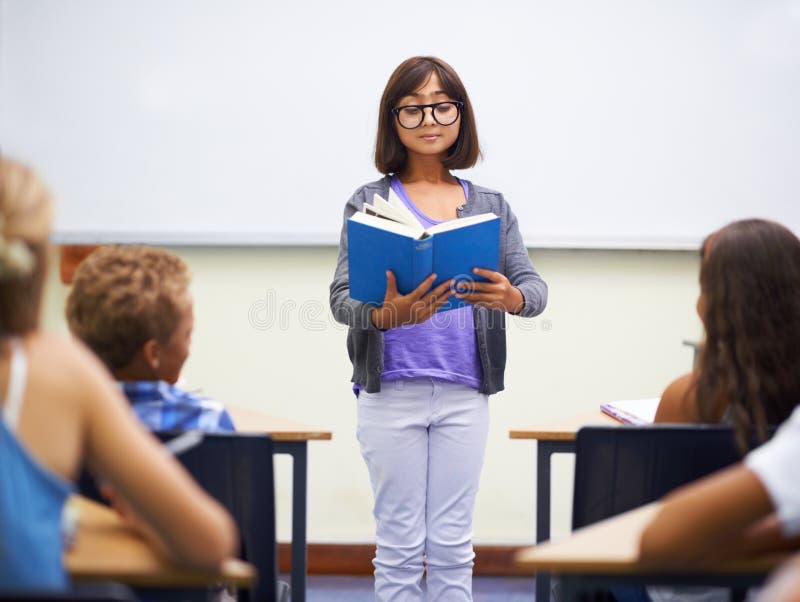 Classroom, Child and Reading a Book in Presentation, Information and ...