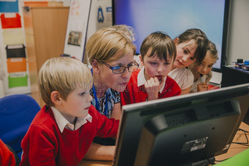 Classroom Computer Work stock photo. Image of engrossed - 91445812