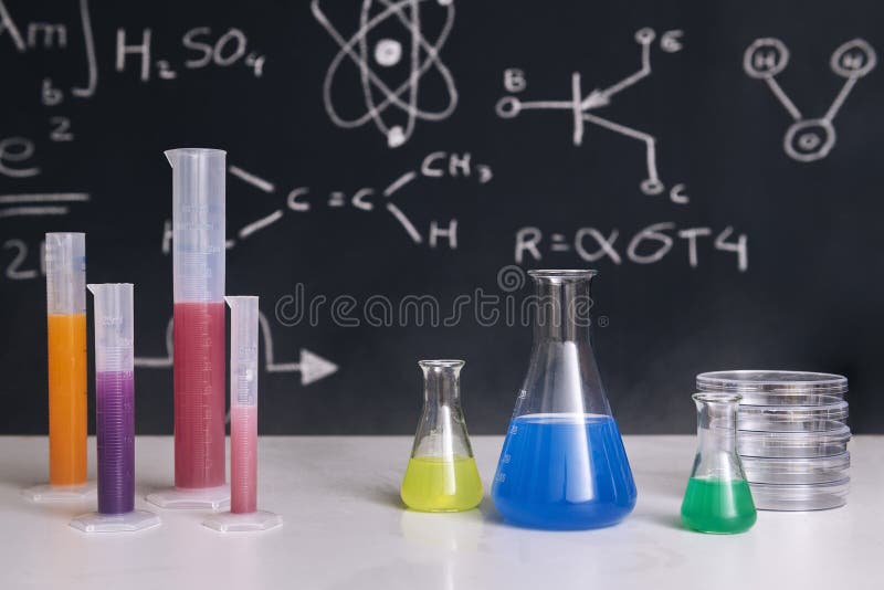 Classroom Desk with Flasks with Colored Chemicals Stock Image - Image ...