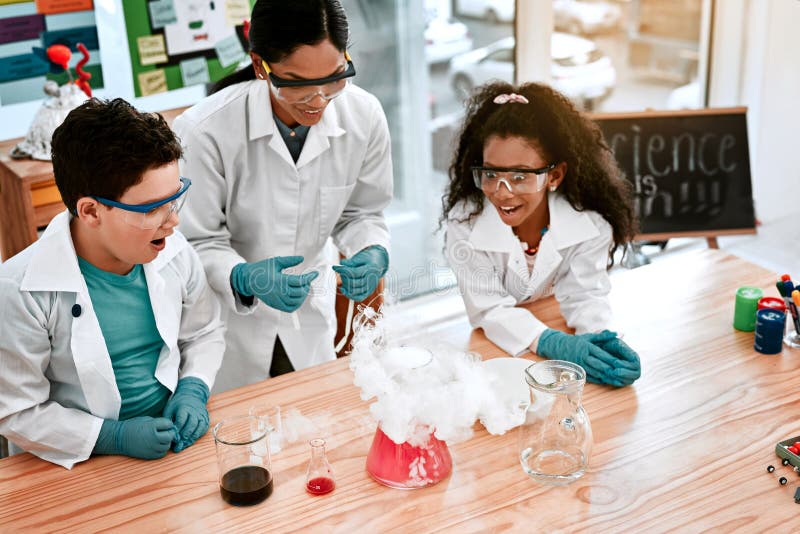 Classroom, Education or Study with Scientist and Students at Table in ...