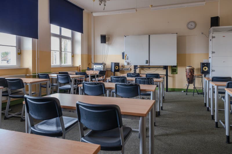 A Classroom Full of Tables and Chairs Stock Photo - Image of study ...