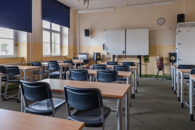 A Classroom Full of Tables and Chairs Stock Image - Image of young ...