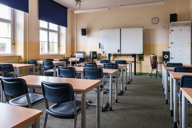 A Classroom Full of Tables and Chairs Stock Photo - Image of school ...