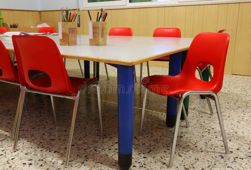 Classroom of a Kingergarten with Red Chairs and Tables Stock Photo ...