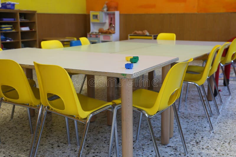 Classroom of a Kingergarten with Yellow Chairs and Tables Stock Image ...