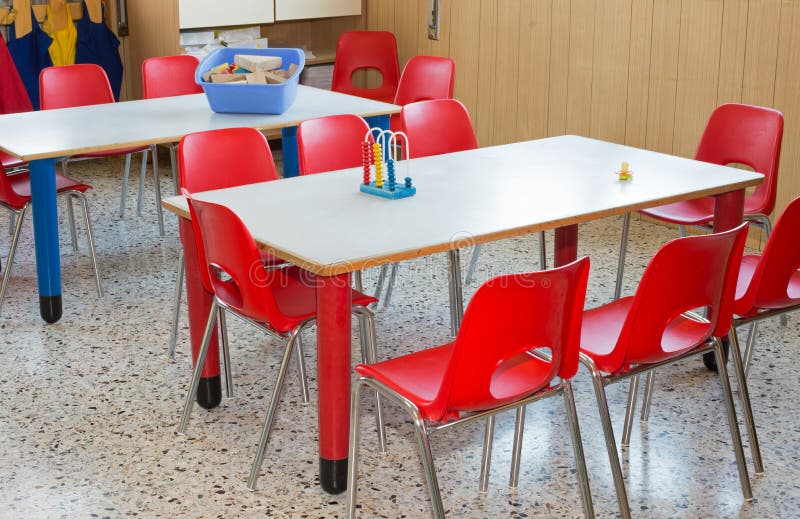 Classroom Nursery with Red Chairs and Desks Stock Photo - Image of ...