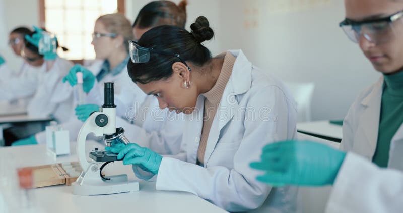 Classroom, Science and Students in Laboratory with Microscope for ...