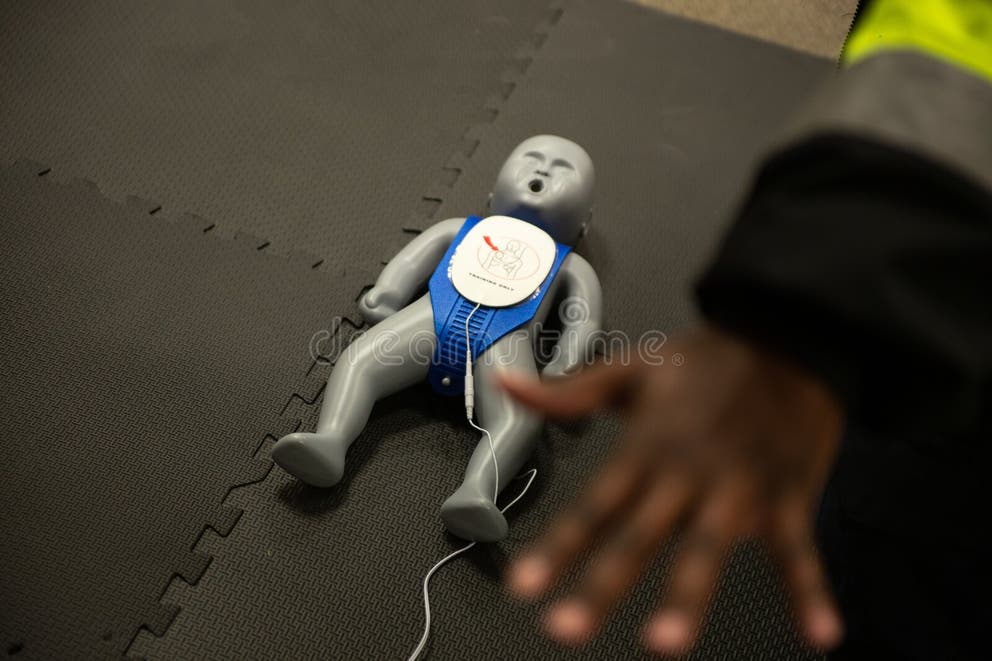 Classroom of Students Learning the Basics of First Aid with a Doll ...