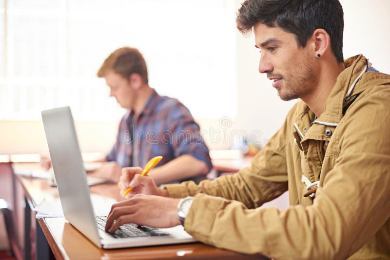 Classrooms that Support Modern Technology. a Student in Class Using a ...