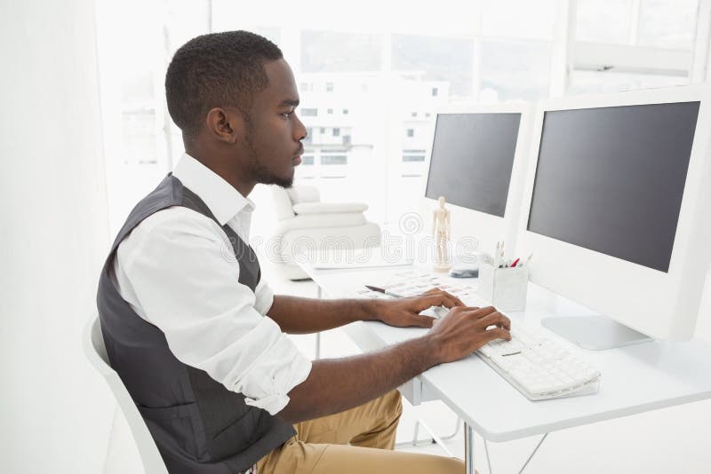 Classy Businessman Concentrating and Using Computer Stock Photo - Image ...