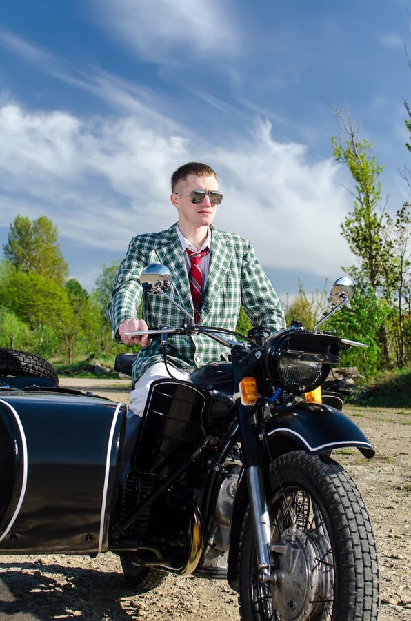 Classy guy on a motorcycle stock photo. Image of nature - 24909040