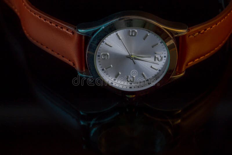 Classy Leather Watch Reflected on Black Table Stock Photo - Image of ...