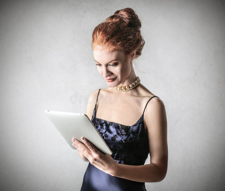 Classy Woman Using a Tablet Stock Image - Image of classy, computer ...