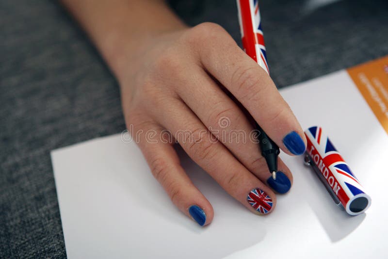 Clavo de Union Jack pulido imagen de archivo. Imagen de dedos - 38472241