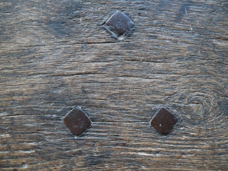 3 Clavos En La Madera Del Vintage Foto de archivo - Imagen de textura ...