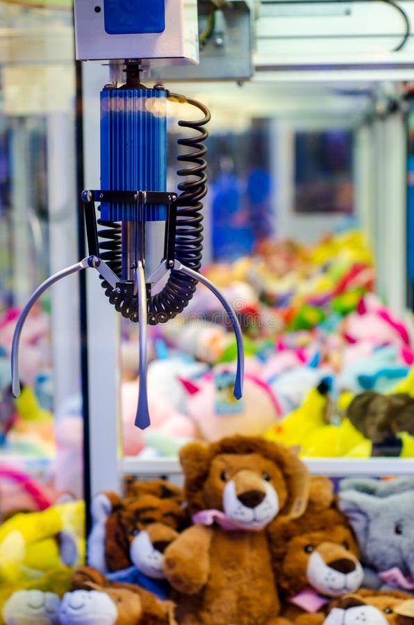 A Claw Crane Game Machine with Toys Stock Image - Image of arcade ...