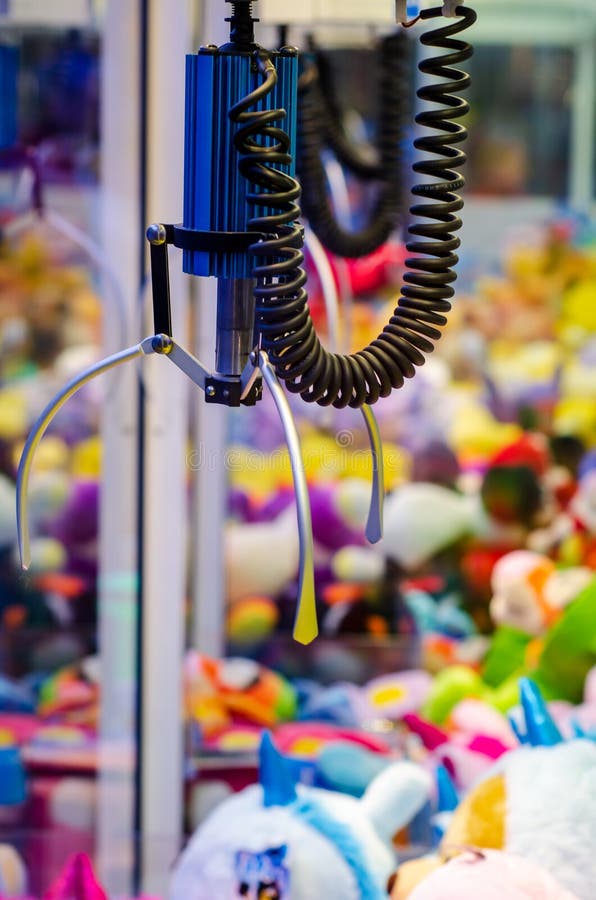 A Claw Crane Game Machine with Toys Stock Photo - Image of europe, luck ...