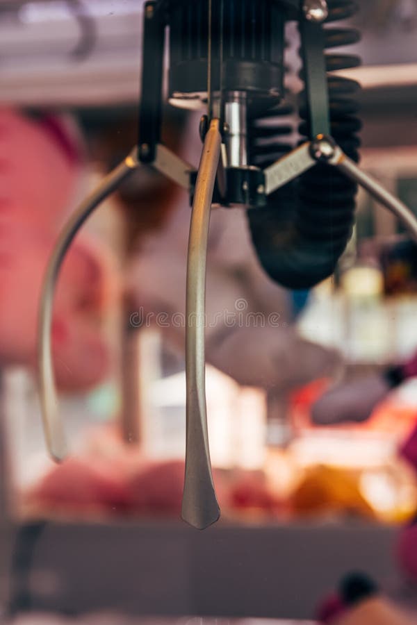 Claw Crane Machine Grabber in Carnival Arcade Stock Image - Image of ...