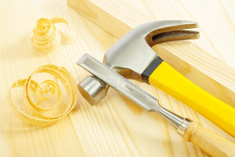 Claw Hammer and Chisel on Wooden Board Stock Image - Image of curled ...