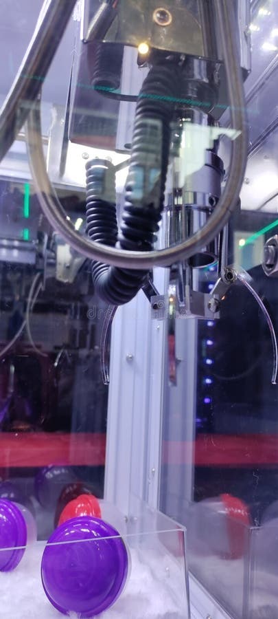 Claw Machine Inside Colorful Led Lights Stock Photo - Image of claw ...