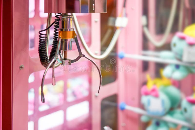 Doll Picker or Claw Clamp Machine in Game Arcade,clamping Doll Stock ...