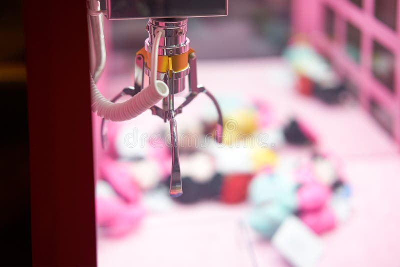 Doll Picker or Claw Clamp Machine in Game Arcade,clamping Doll Stock ...