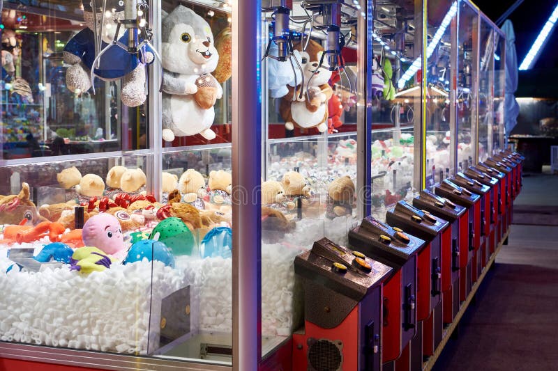Claw toy cranes at fair stock image. Image of business - 348490581