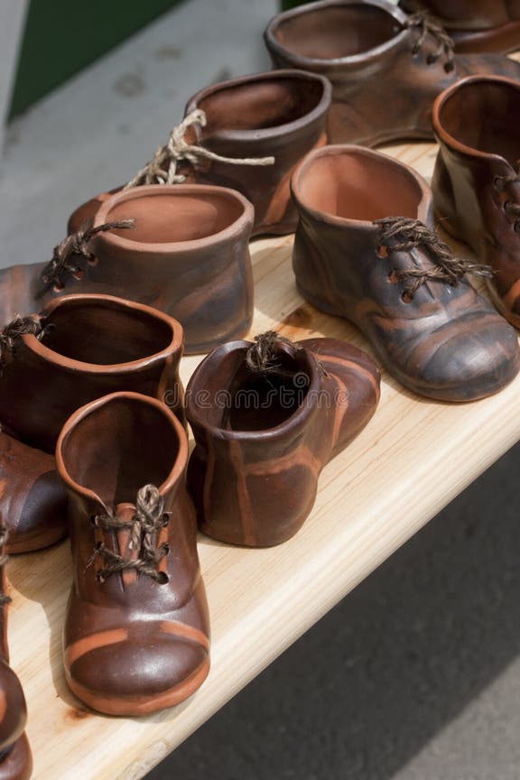 Handmade Clay Boots Used Like Flower Pots Stock Photo - Image of rustic ...