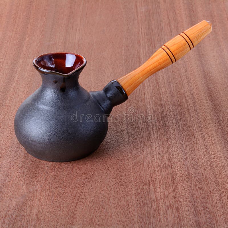 Clay Coffee Pot on a Wooden Table, Front View Stock Photo - Image of ...
