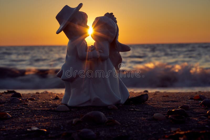 Clay figurine on the beach stock photo. Image of promenade - 250521698