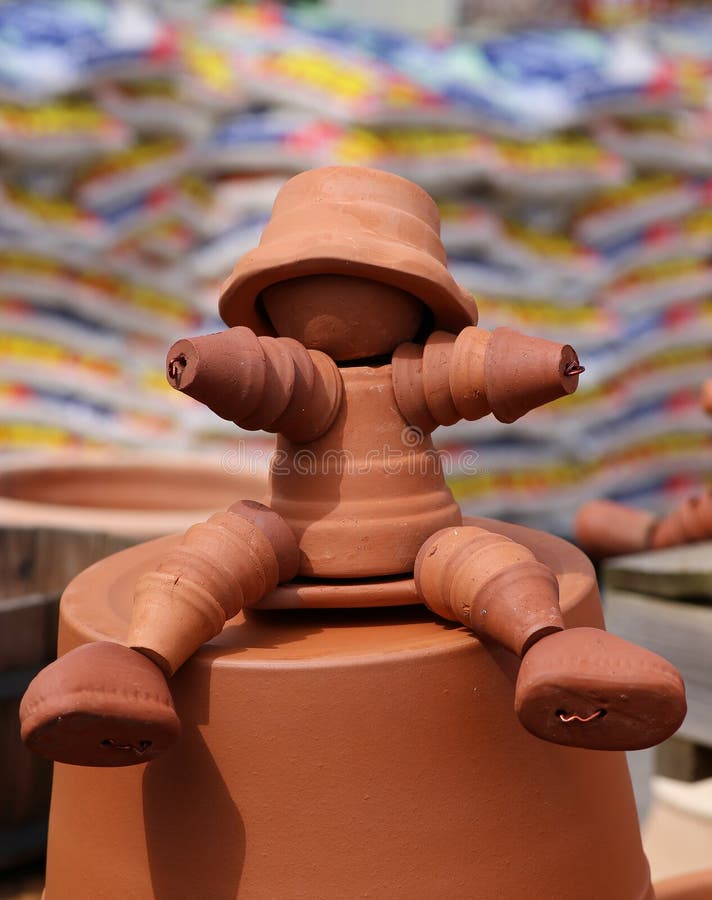 Clay Flower Pot Man Figure stock image. Image of ceramic - 33264839