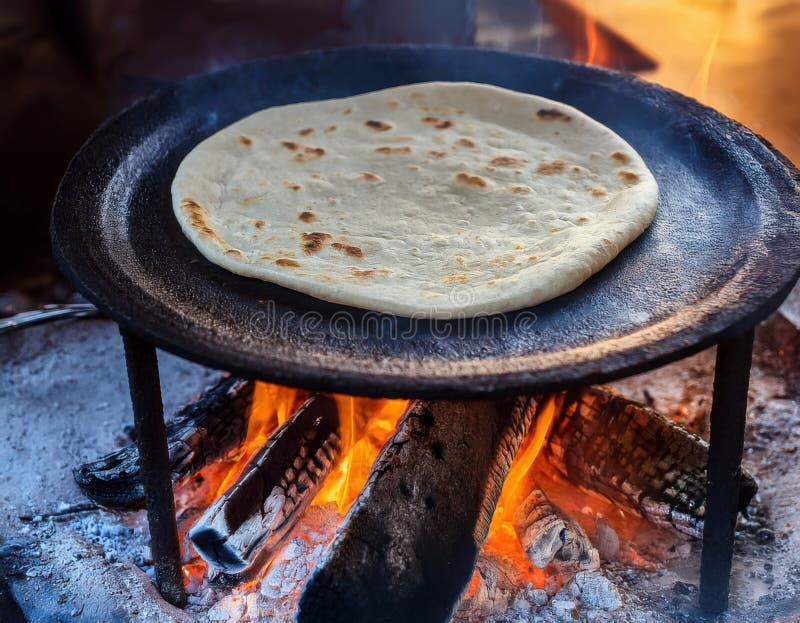 A Clay Griddle Cooking Flatbreads Over Hot Coals Stock Illustration ...