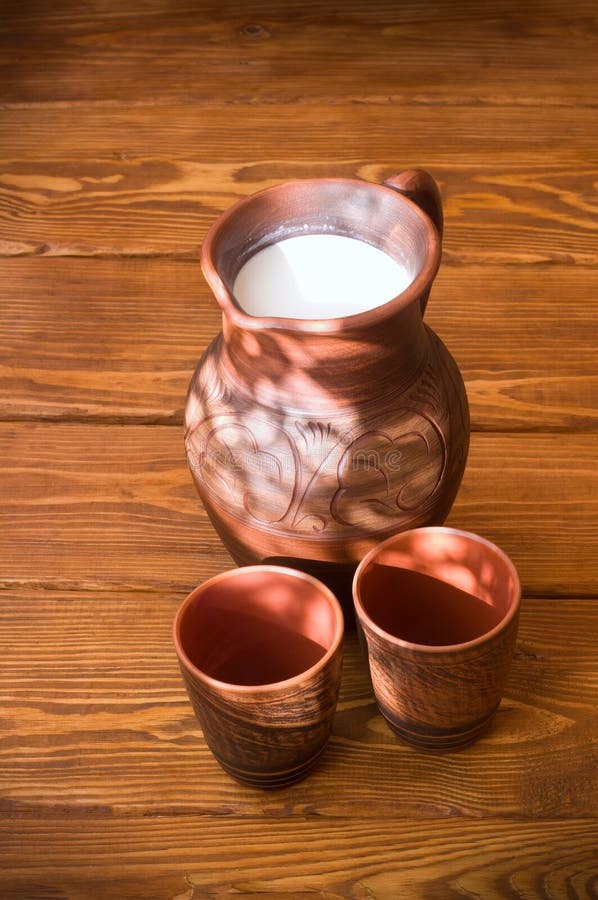 Clay jug with milk stock photo. Image of stilled, food - 51687234