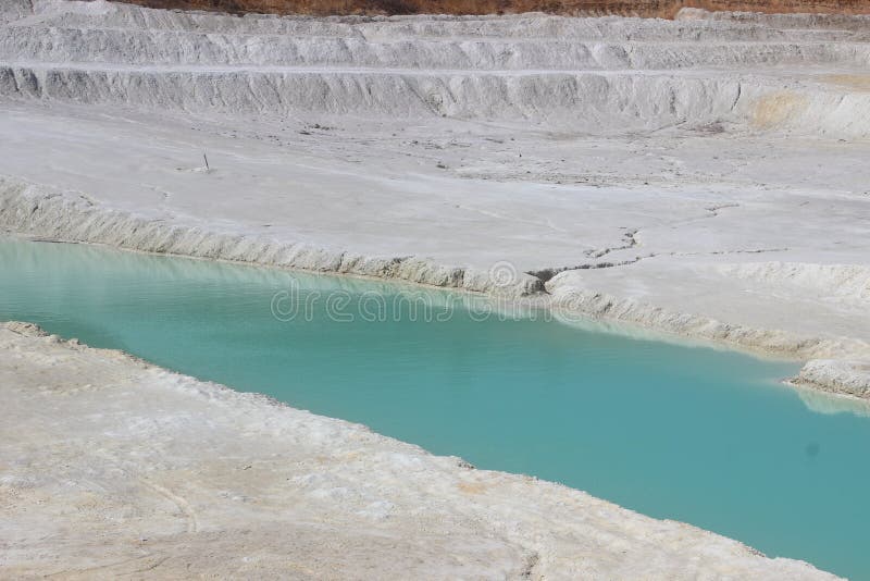 Clay Mining. Beautiful Background of White Clay. Blue Water. Stock ...
