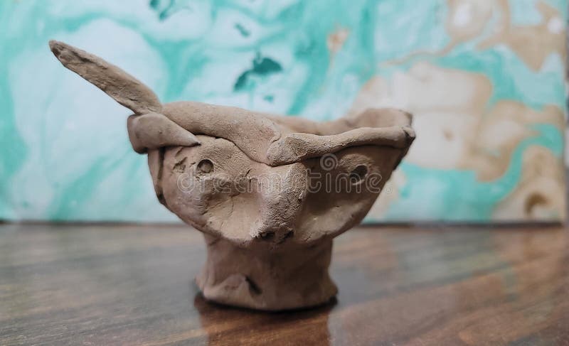 Clay Modelling To Show an Abstract Face on an Abstract Background ...