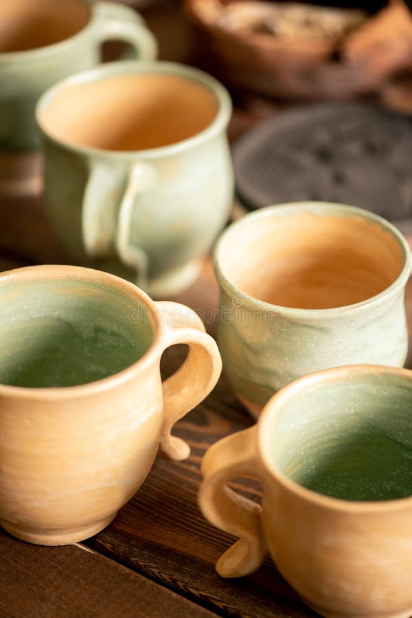 Clay mugs stock image. Image of artist, occupation, potter - 150091145