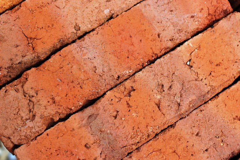 Clay Orange Bricks for a Rural Building Stock Photo - Image of ...