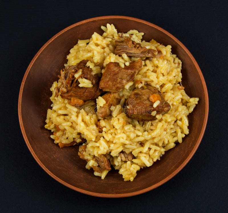 Clay Plate with Rice Pilaf, Meat, Turmeric Stock Image - Image of food ...