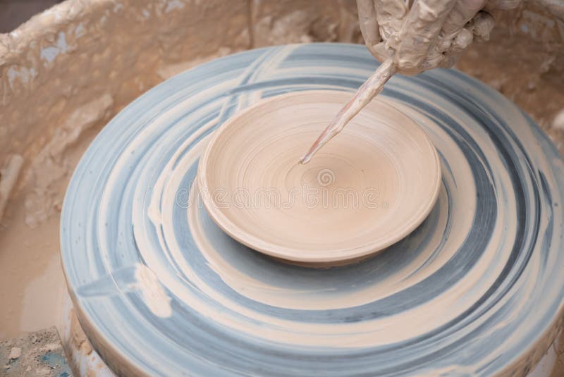 Clay Plate Rotating on the Pottery Wheel Stock Image - Image of ...